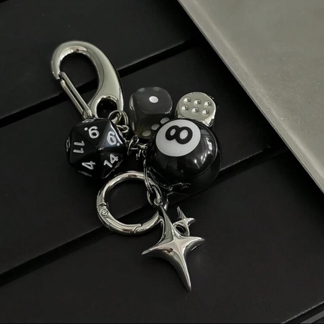 Multi-coloured dice keychain... - Depop