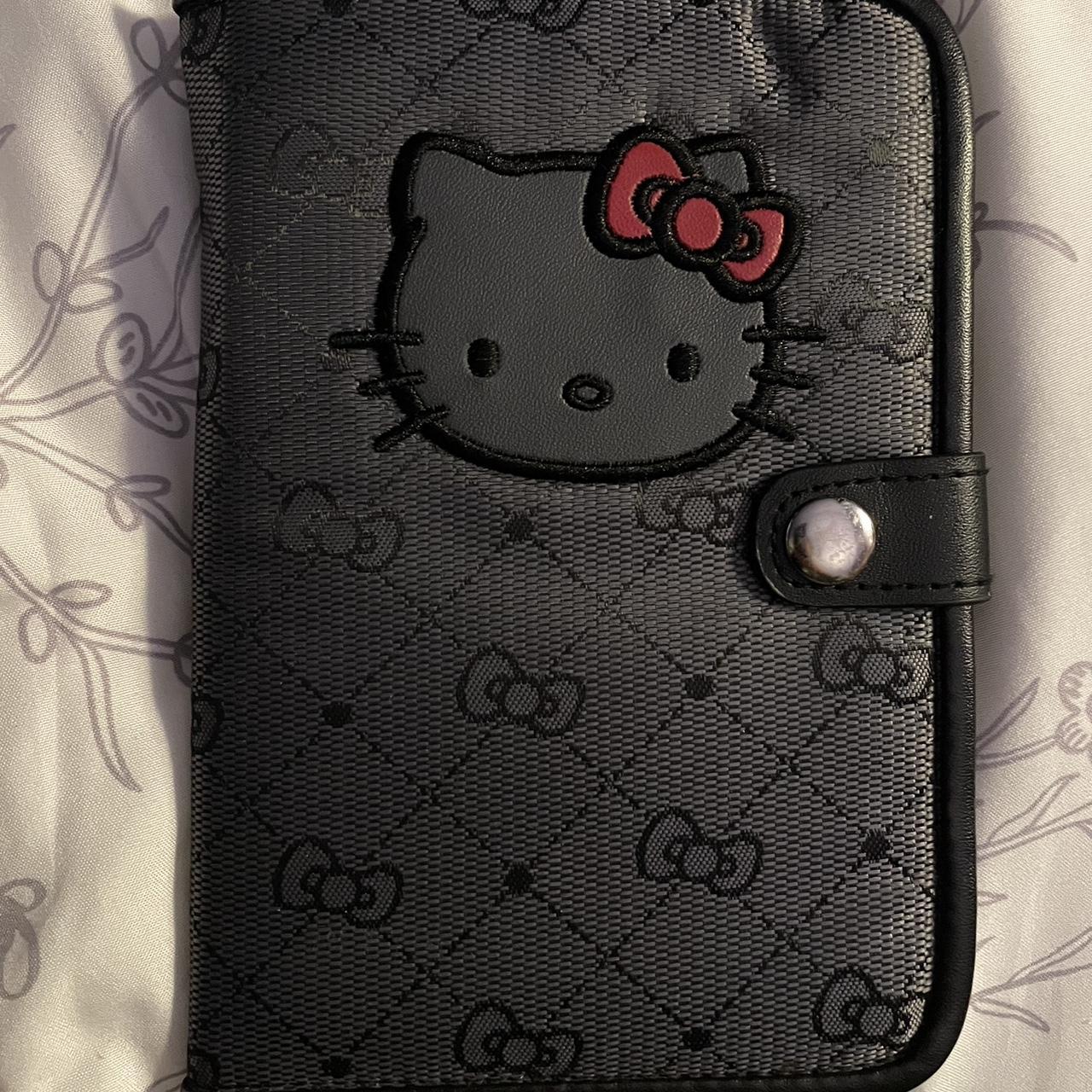 Black Hello Kitty wallet with red accents #kawaii #... - Depop