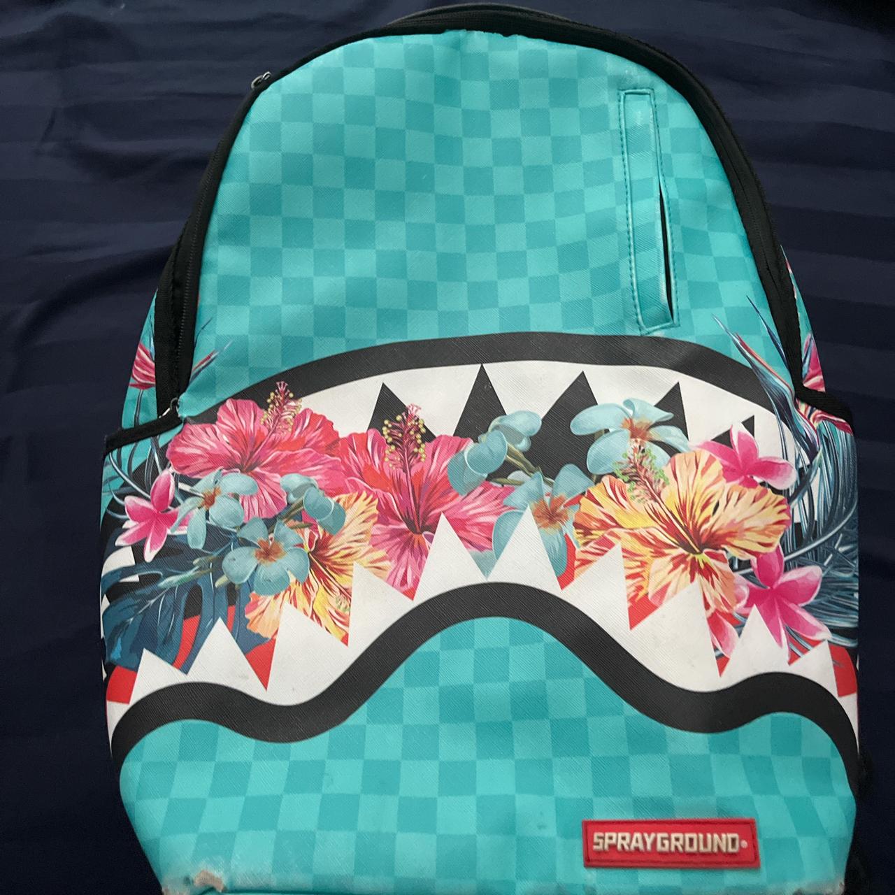 Light blue SPRAYGROUND backpack with floral design... - Depop