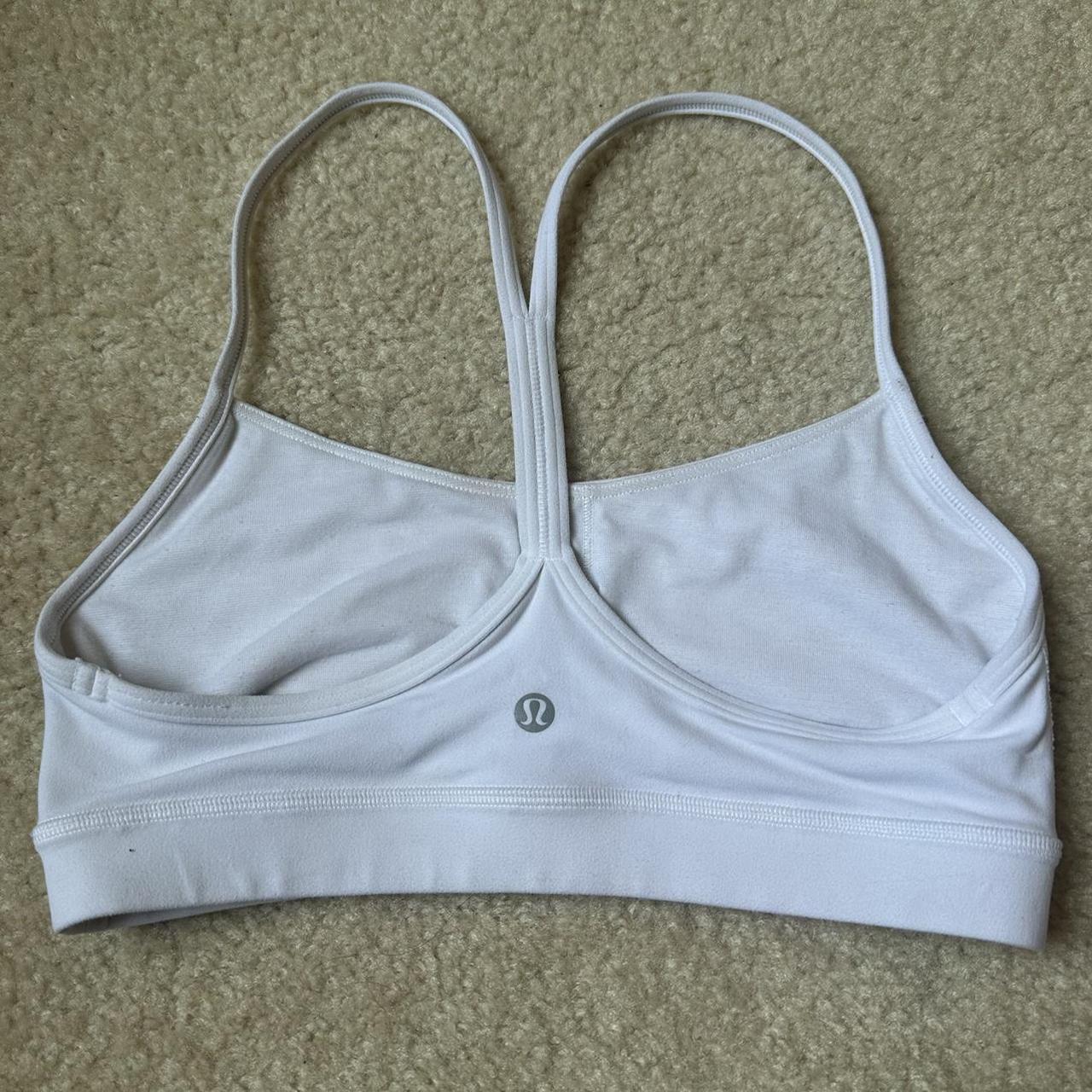 White lulu flow y sports bra Size 6 - Depop