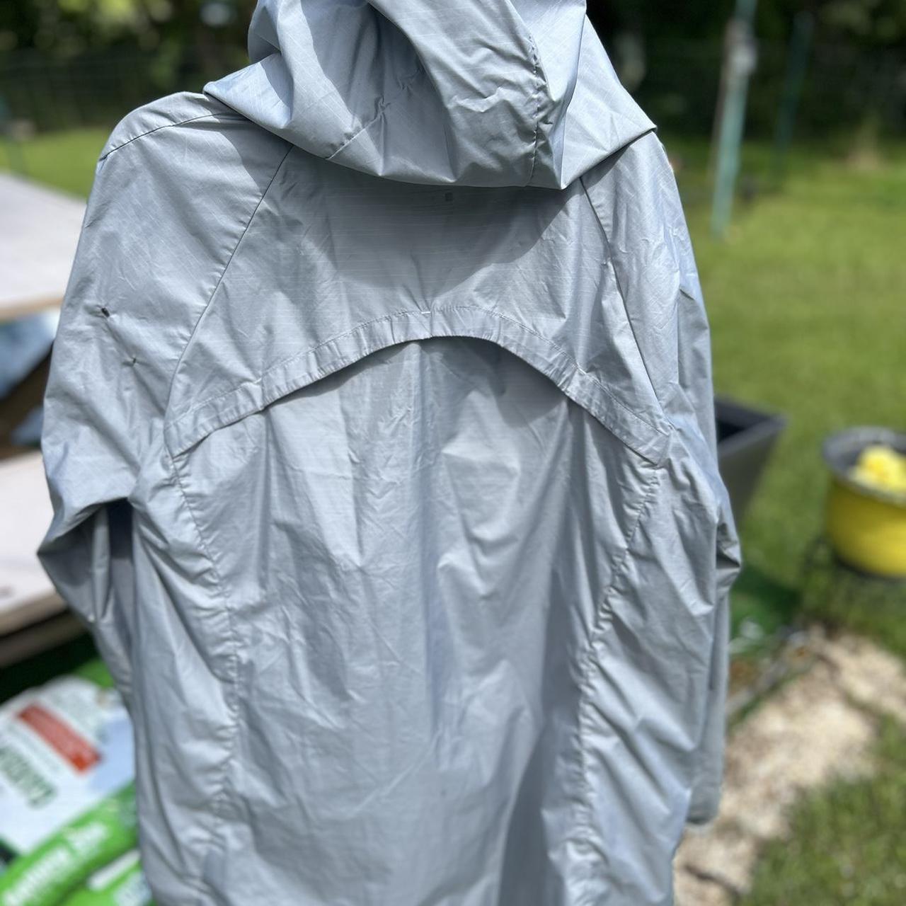 Nike grey rain jacket - Depop