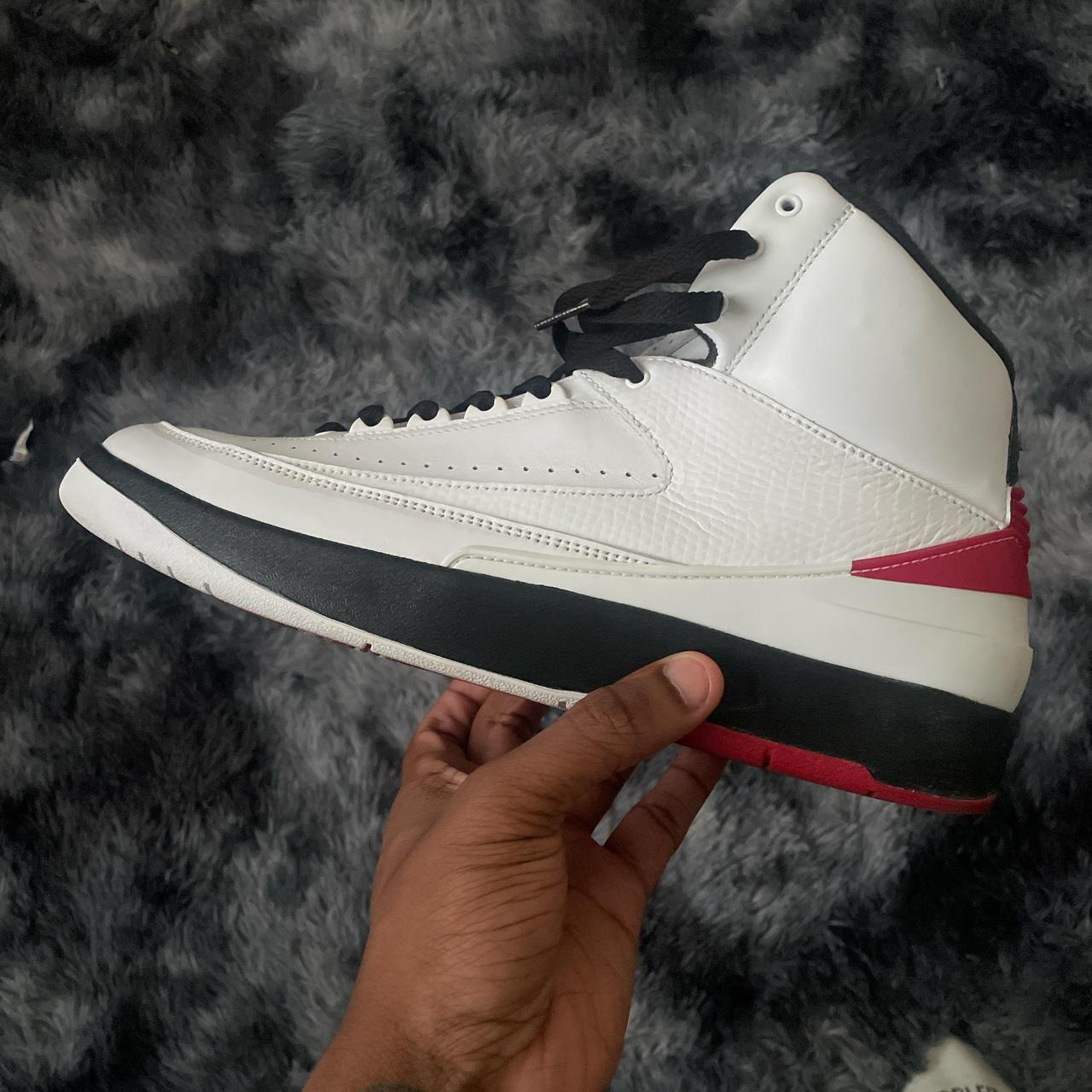 Slight worn jaordan 2 size 11 with box - Depop