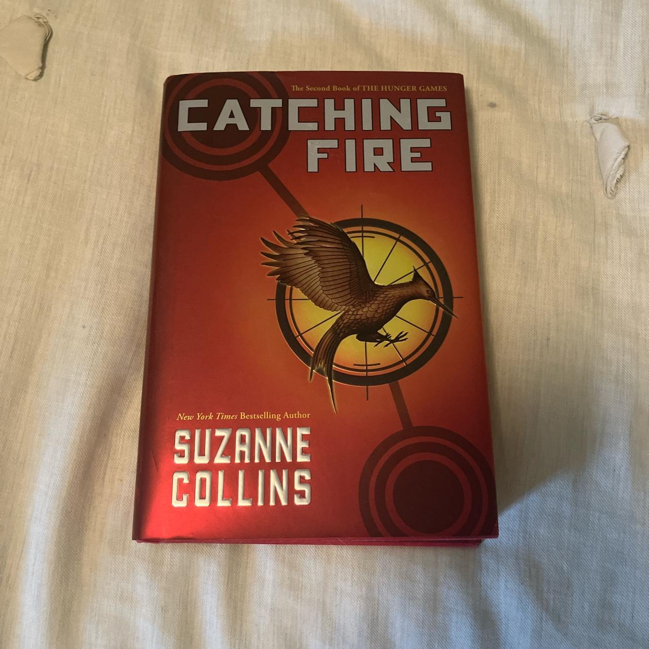 catching fire hunger games book brand new - Depop
