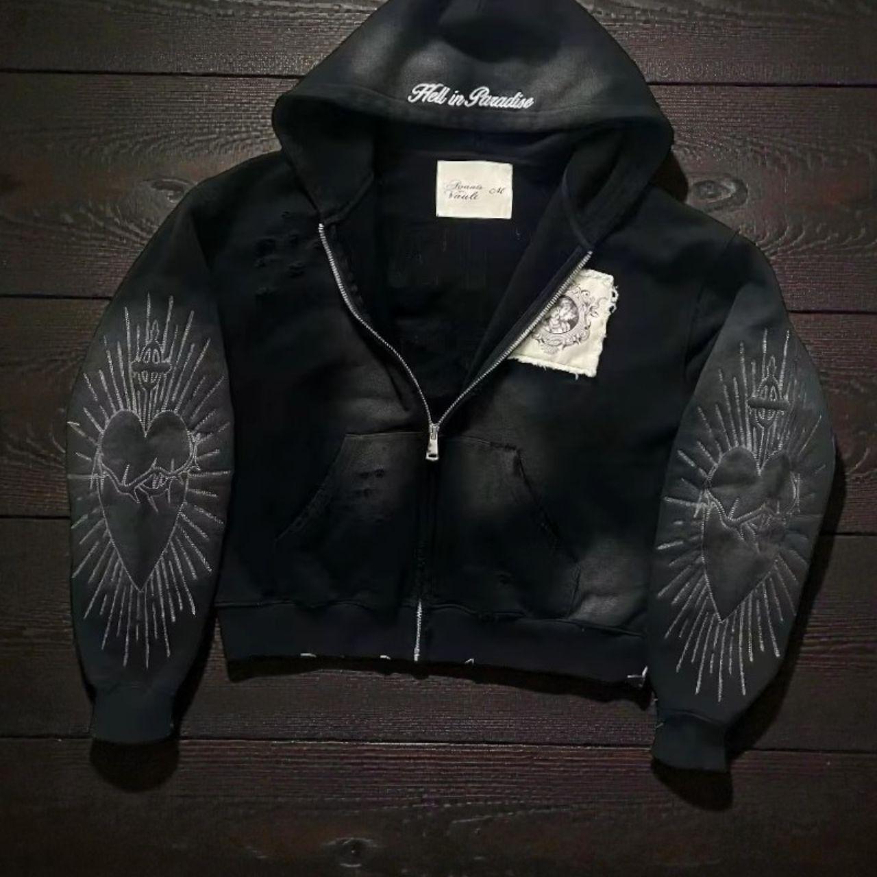 Black zip-up hoodie with embroidered heart graphics... | Depop