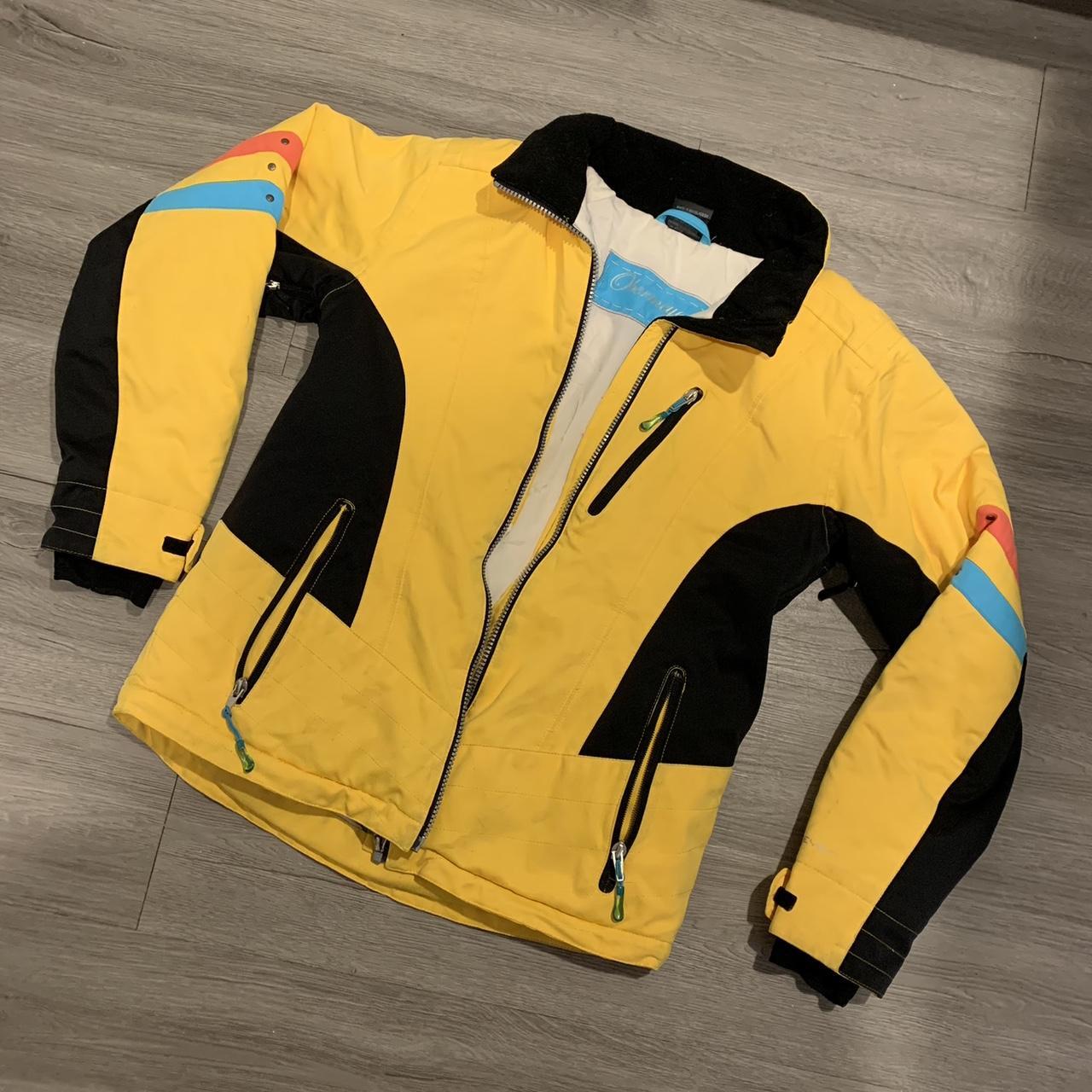 Obermeyer ski jacket, yellow with red black and blue... - Depop