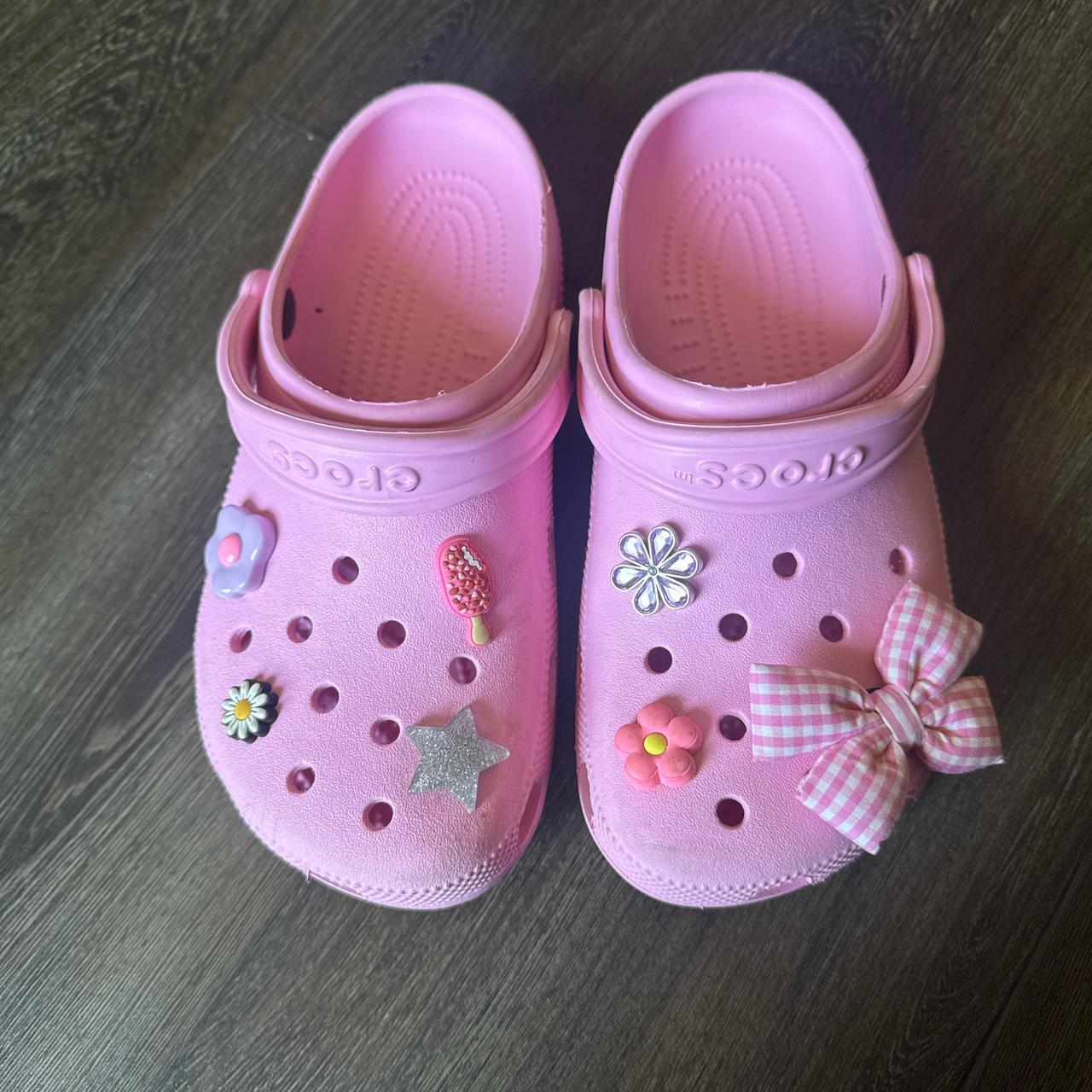 Pink Crocs clogs with rhinestone and bow decorations... | Depop