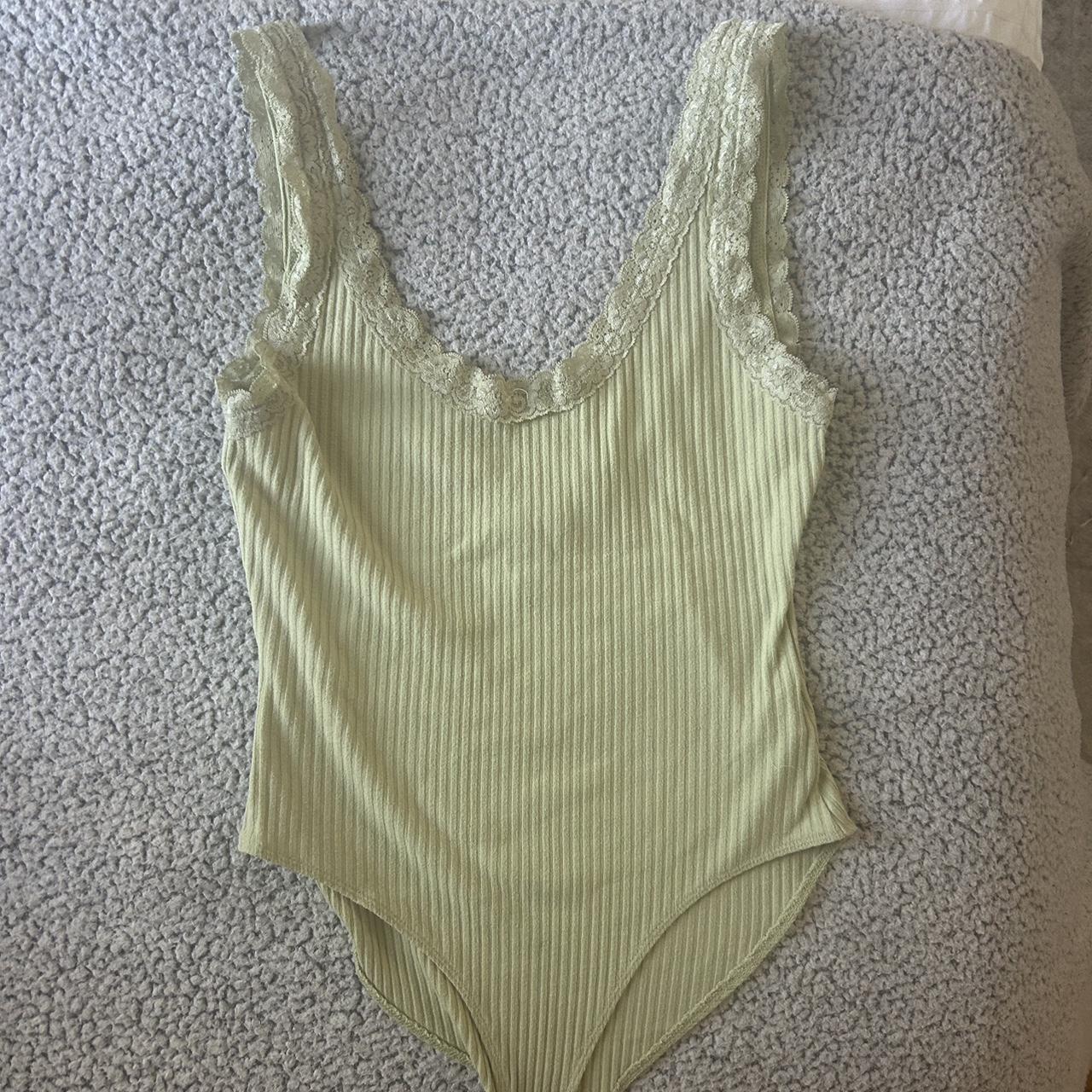 Light green low back bodysuit #greenbodysuit... - Depop