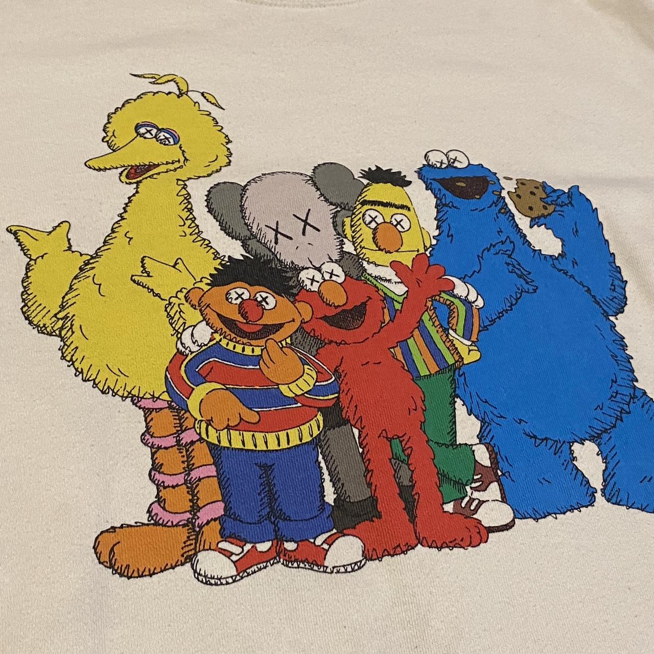 Kaws x Sesame Street sweater 🙏 Size medium 🫡 - Depop