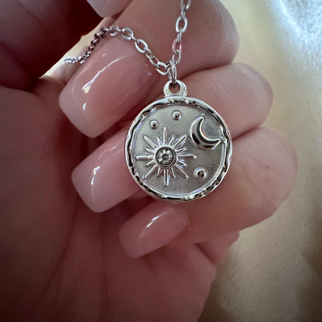 Silver sun & moon necklace Stainless steel... - Depop