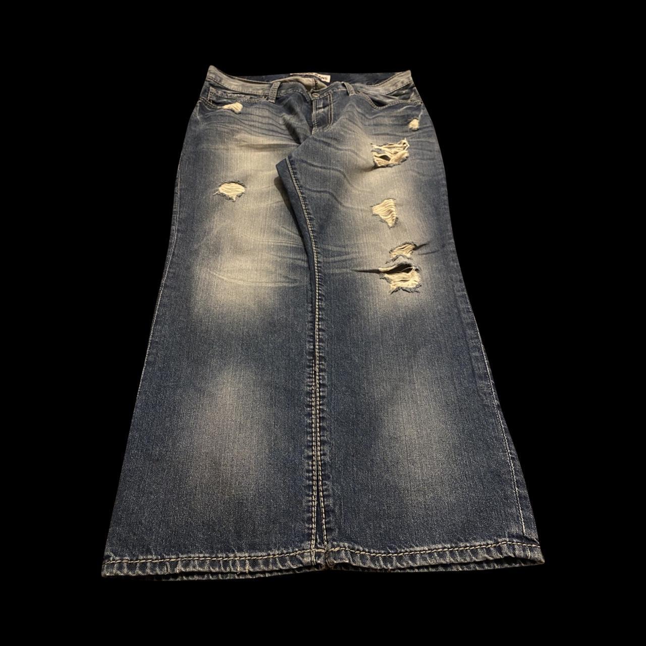 Sick pair of loose jeans with some distressing on... - Depop