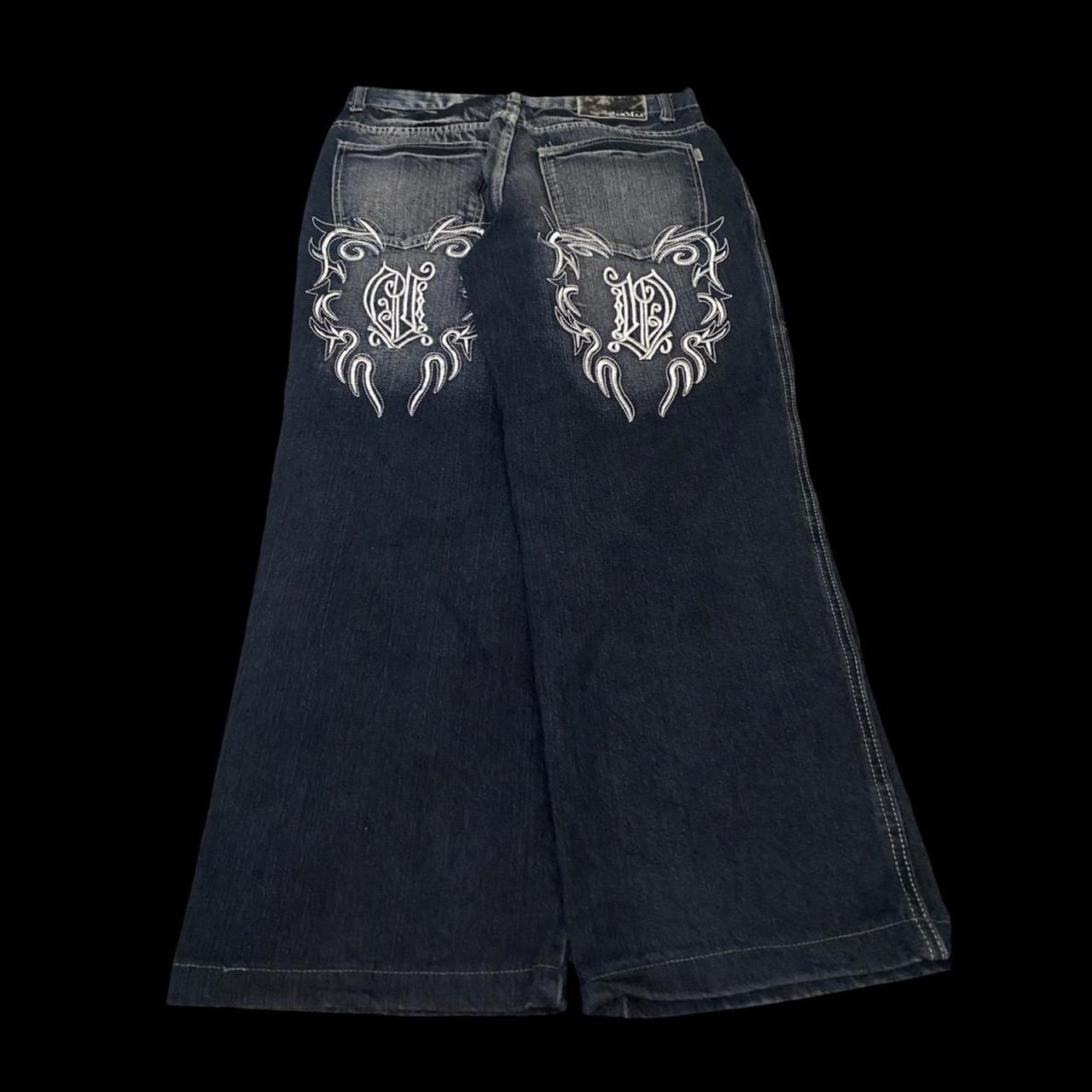 Tuff ass pair of baggy embroidered jeans. The front... - Depop