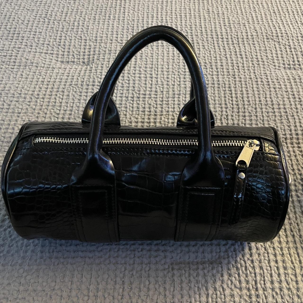 Black mini duffle bag Urban outfitters Only used... - Depop
