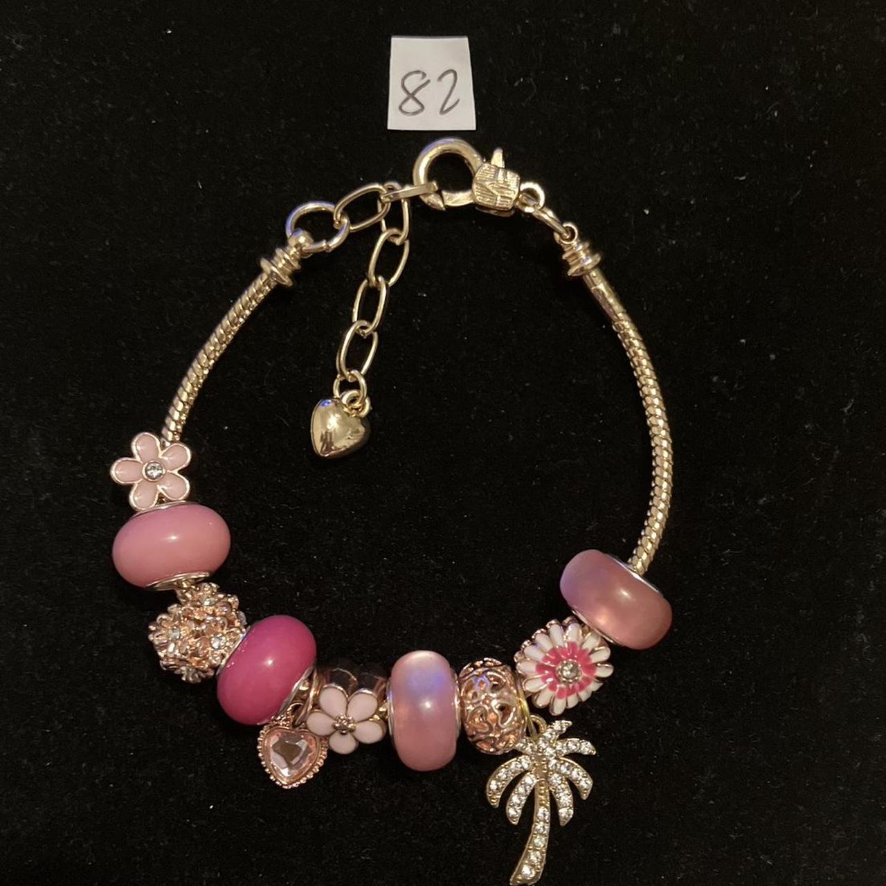 Pandora style Pink and gold charm bracelet... | Depop