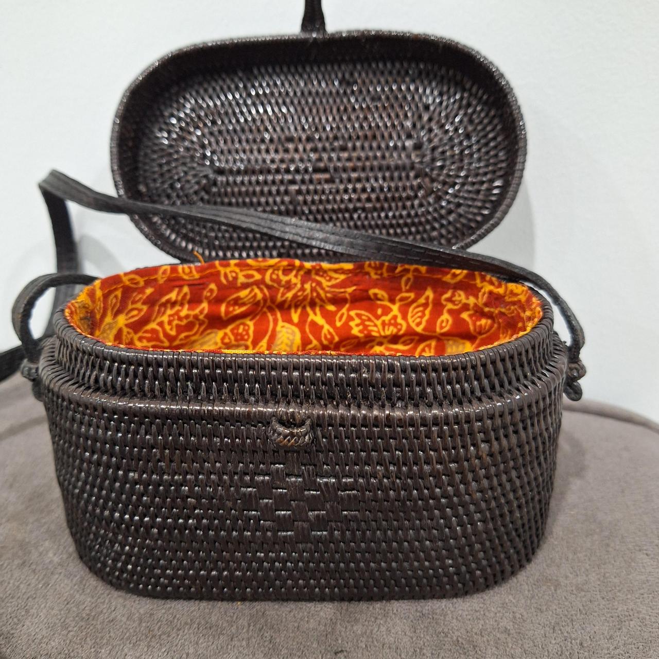 The cutest small black wicker purse. It's big enough... - Depop