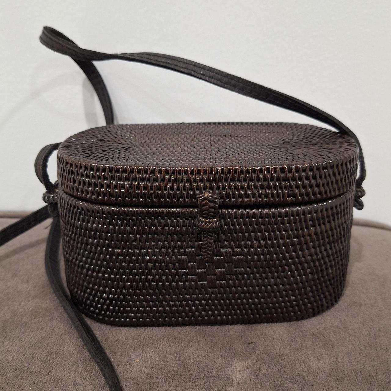 The cutest small black wicker purse. It's big enough... - Depop
