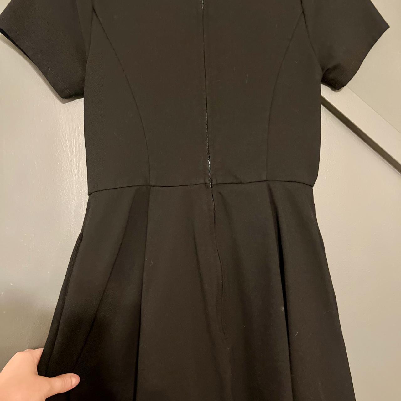 Modcloth. Black, fit-and-flare short-sleeve dress... - Depop