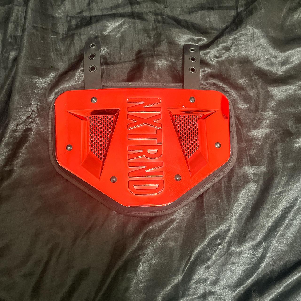 NXTRND chrome red football adult backplate | Depop