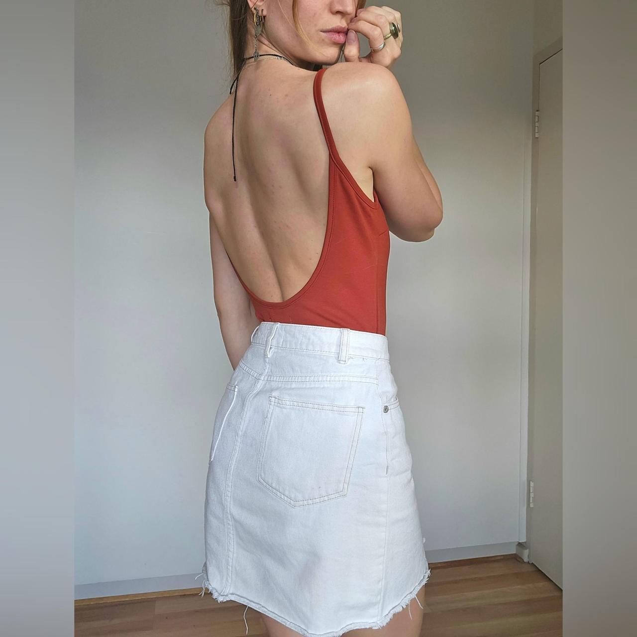 LOST MUSE burnt orange bodysuit with low cut back... | Depop