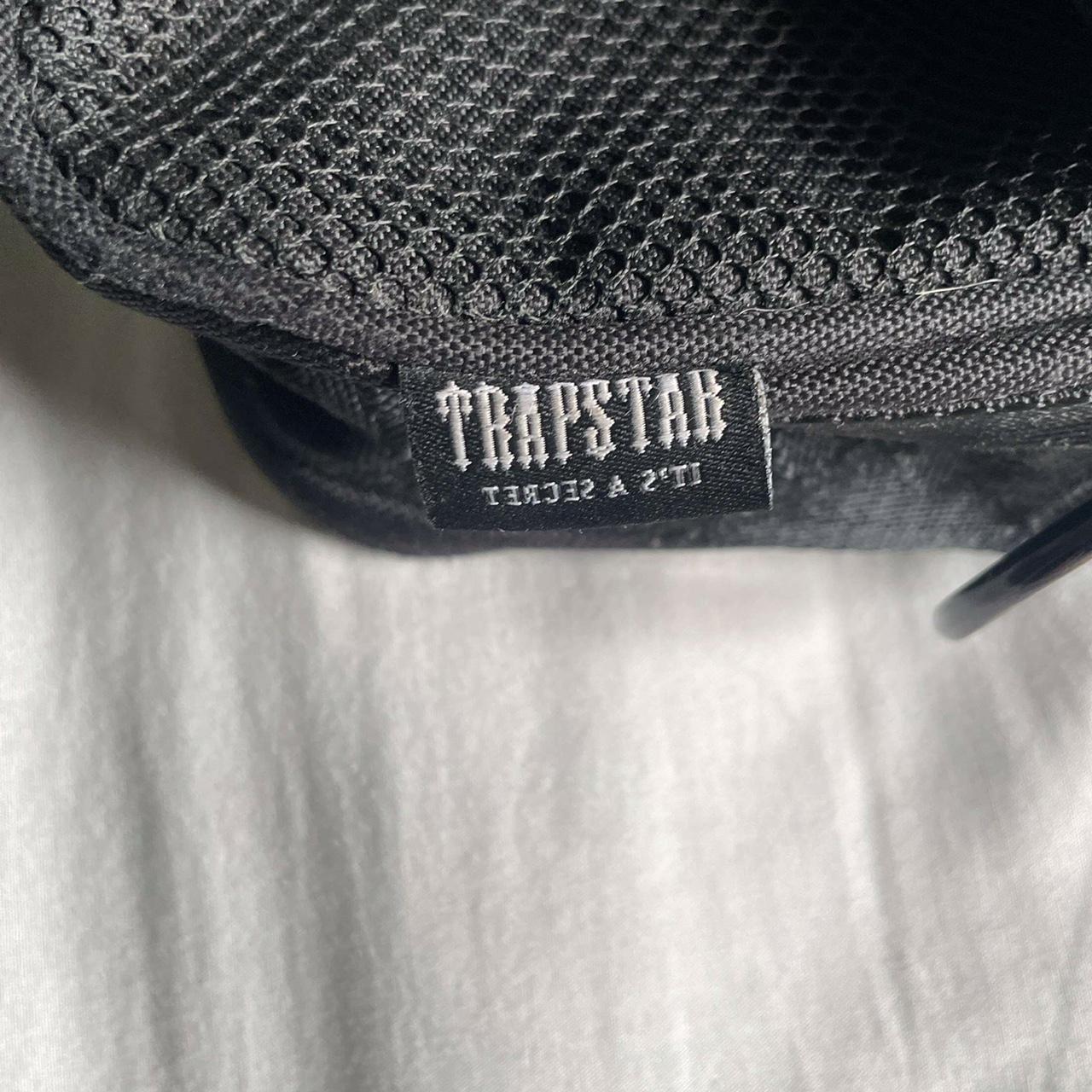 Black trapstar pouch - Depop