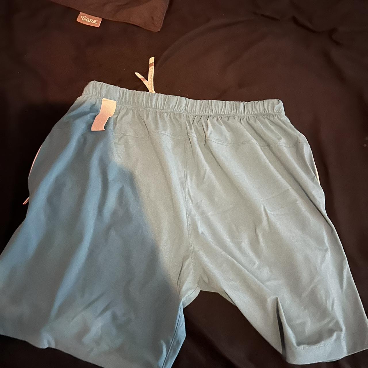 Blue fabletics shorts, Worn once | Depop