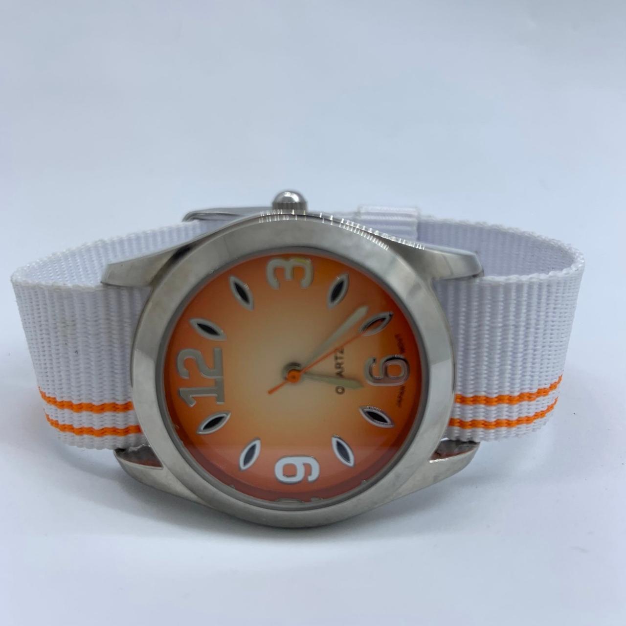 Ladies 32mm Quartz analog watch, silver tone orange... | Depop