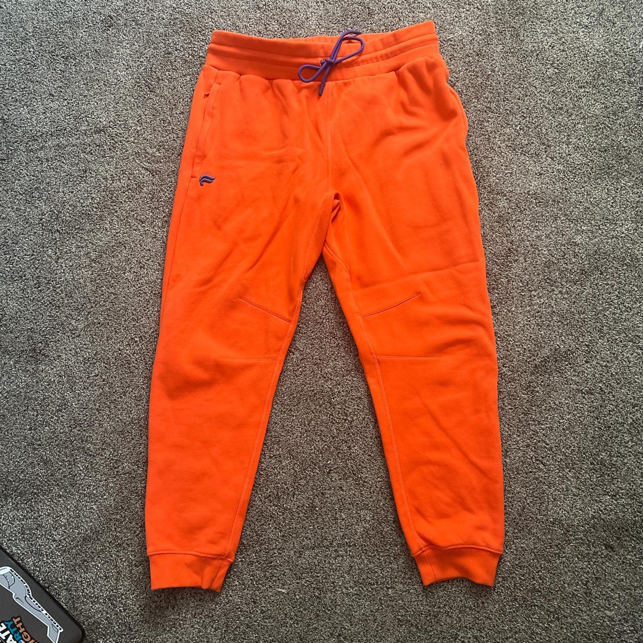 Large Orange Fabletics jogger pants - Depop