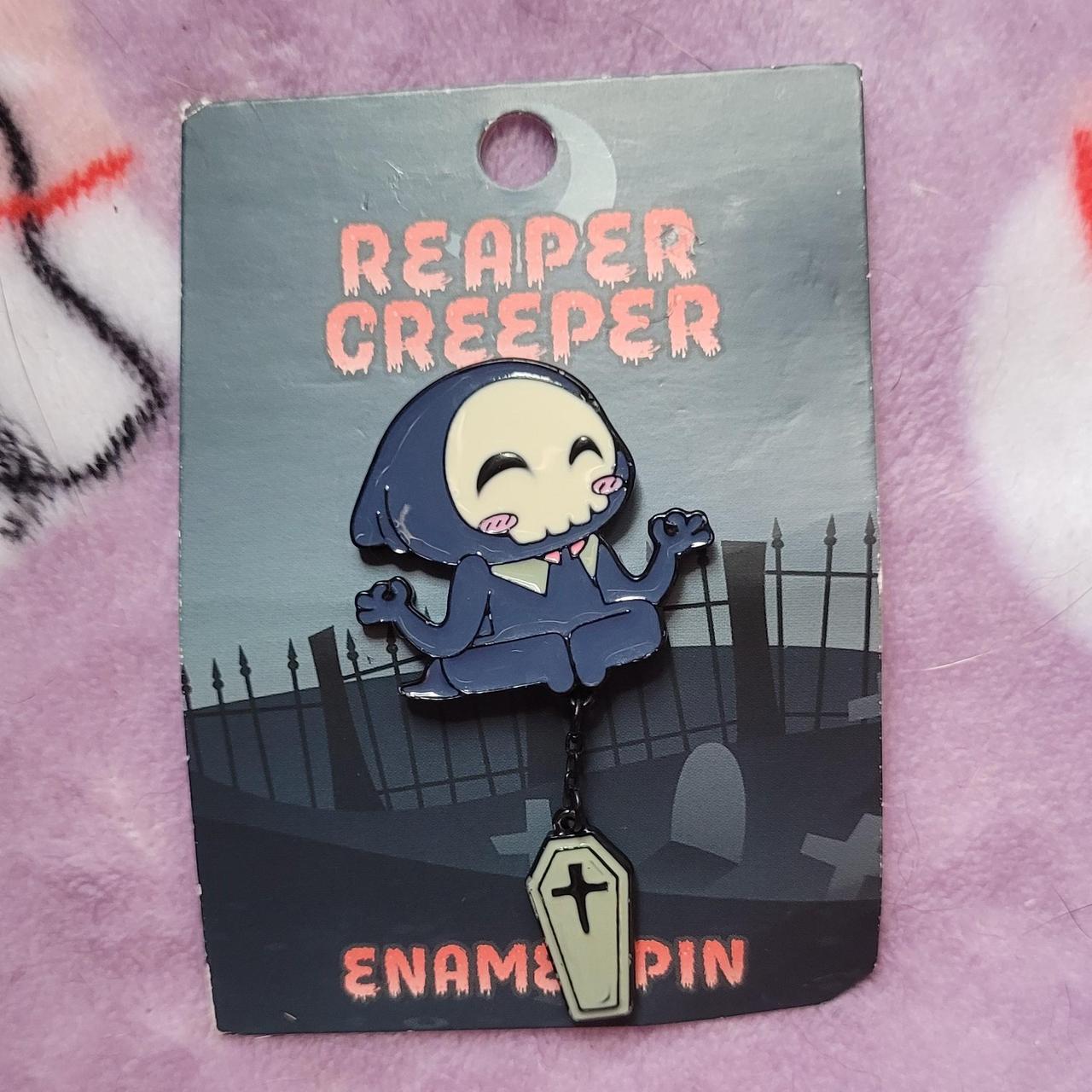 reaper creeper with hanging cross print coffin charm... | Depop