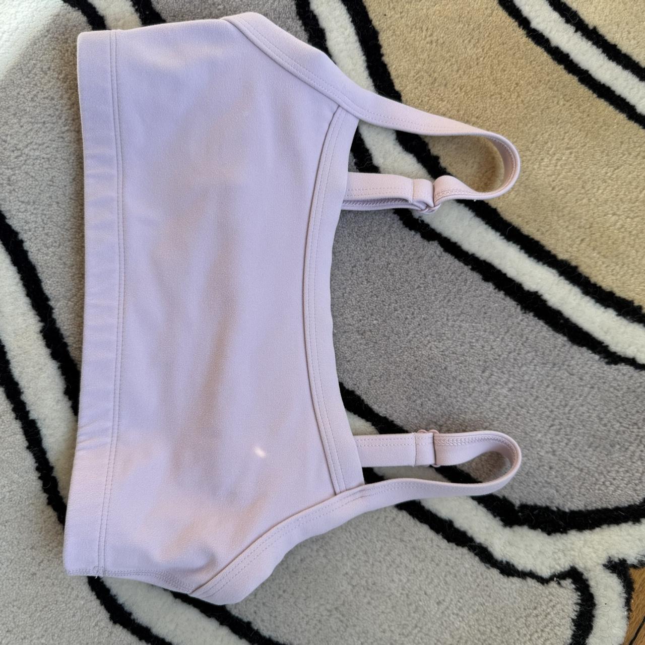 TNA Buttersoft baby pink workout bra, size... | Depop