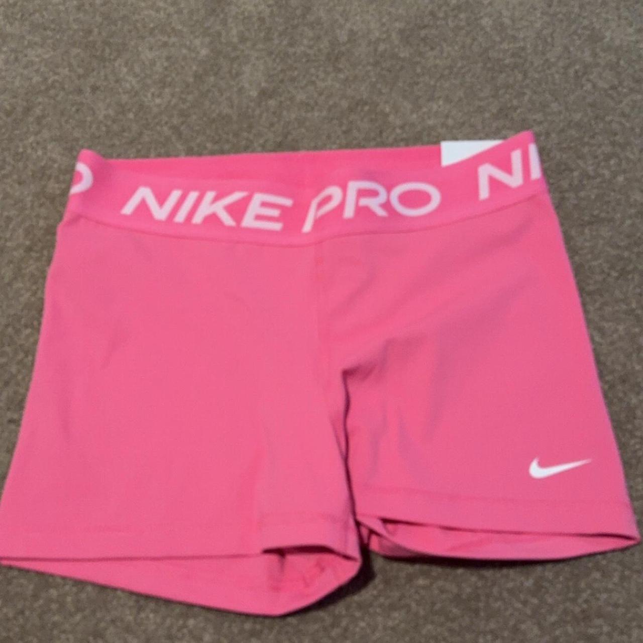 hot pink nike pros, never been worn and still has... - Depop