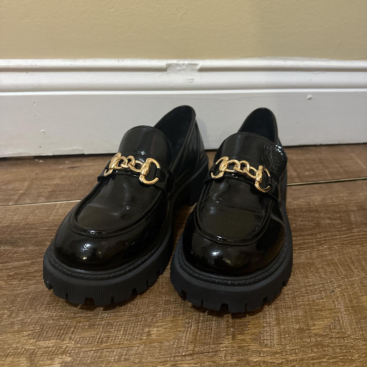 Black, shiny, faux-leather loafers with gold accent - Depop