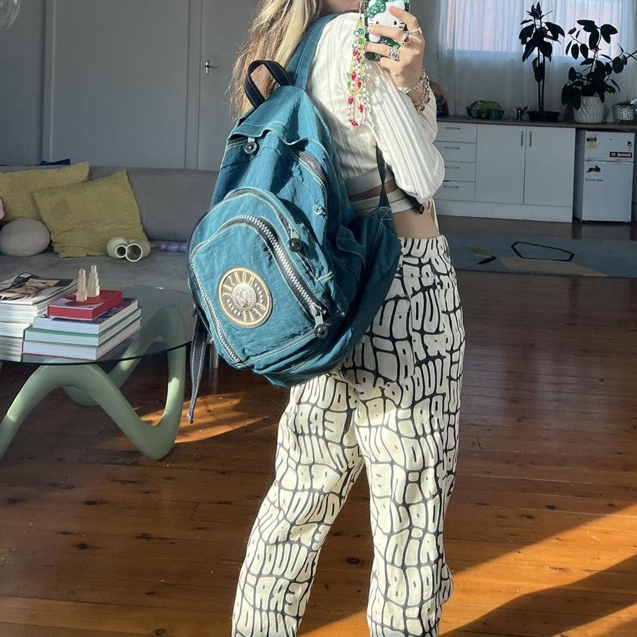 Turquoise green vintage 90’s backpack with lots of... - Depop