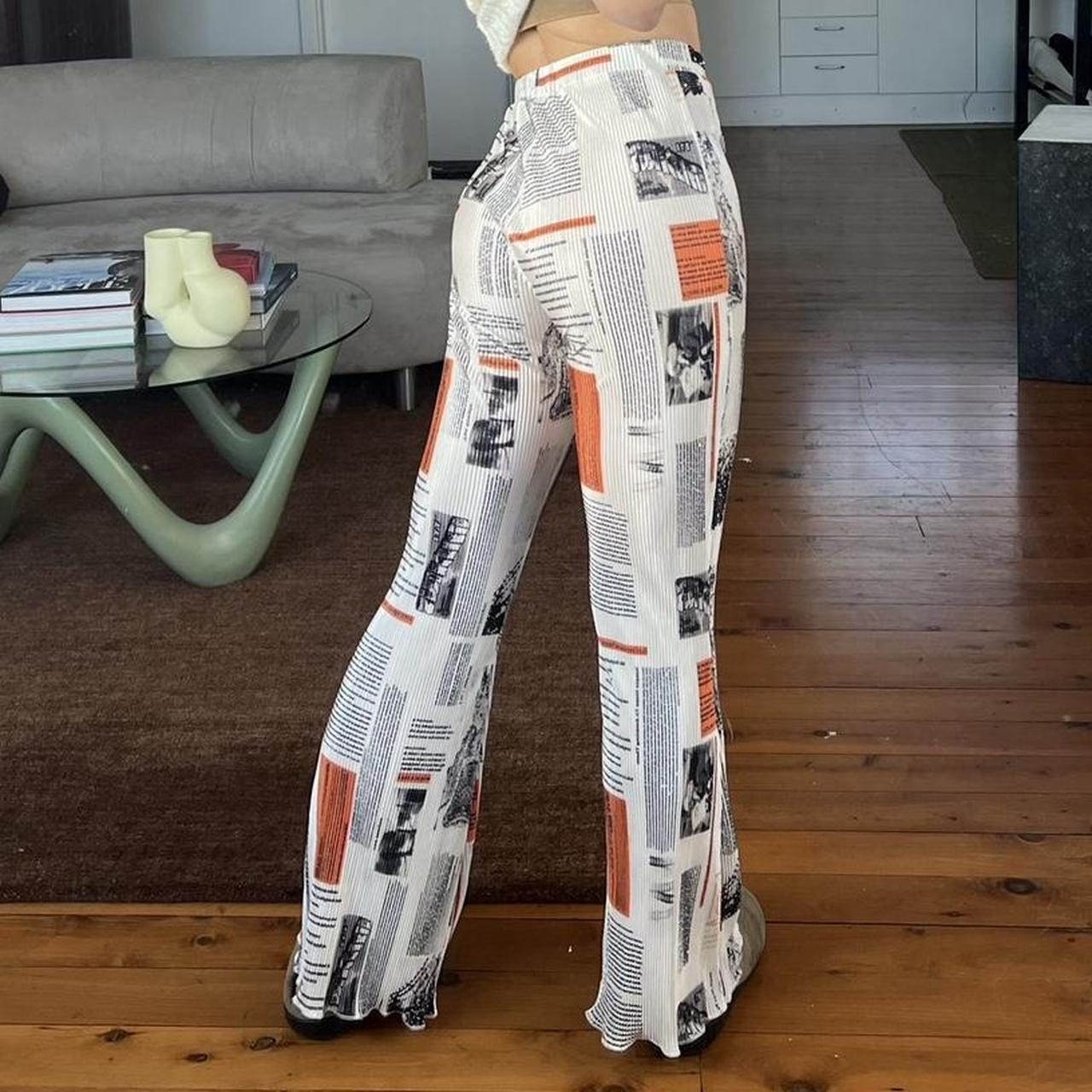 White newspaper print flare pants with elastic... - Depop