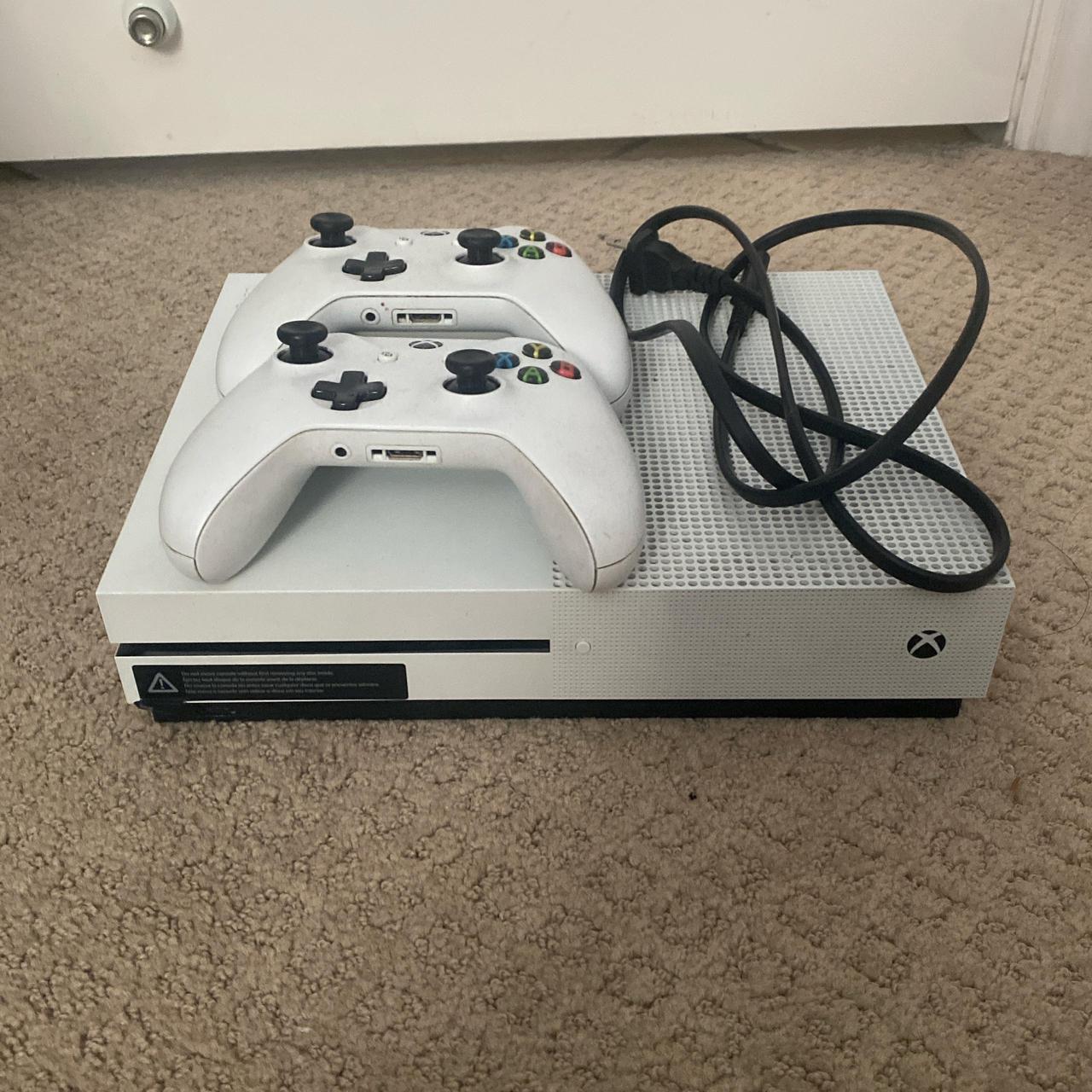 White Xbox One with controllers and power cord - Depop