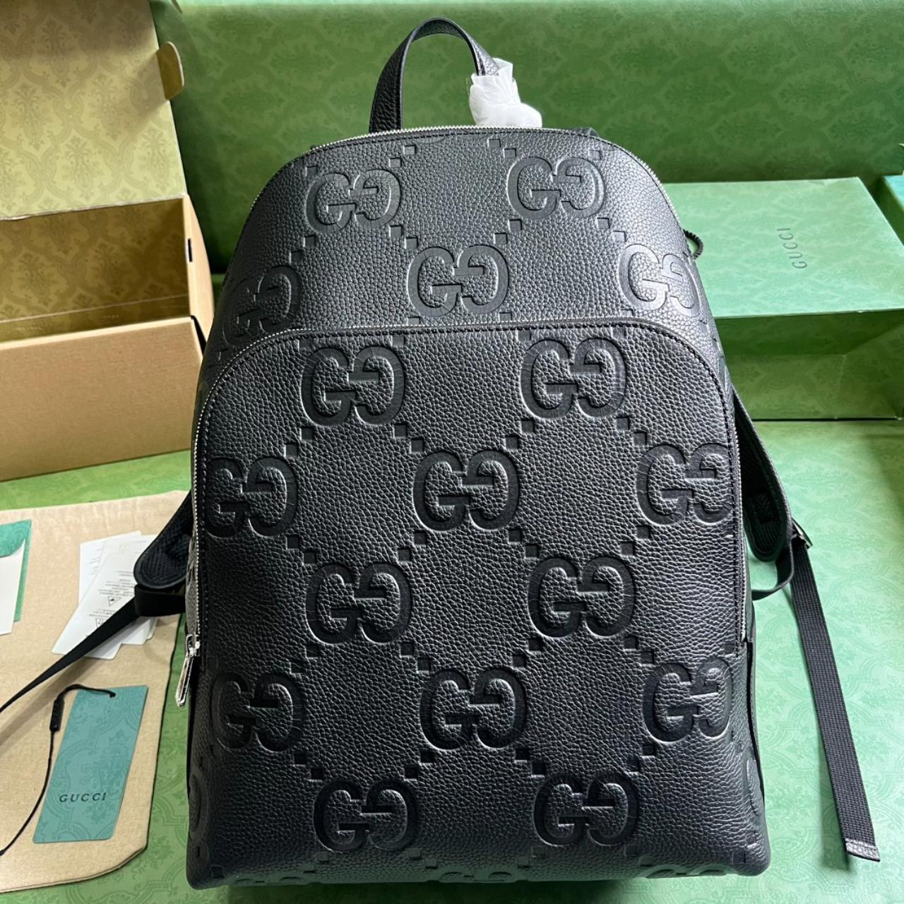 The large super backpack features an inner and outer... - Depop