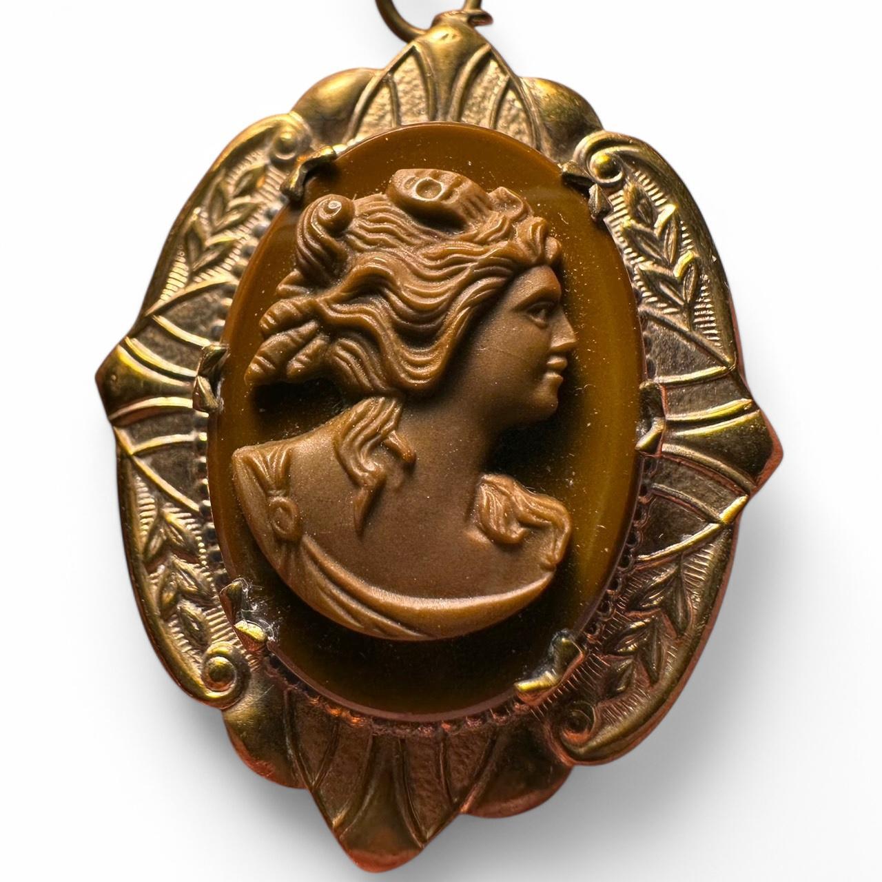 Beautiful vintage brown cameo locket pendant... | Depop