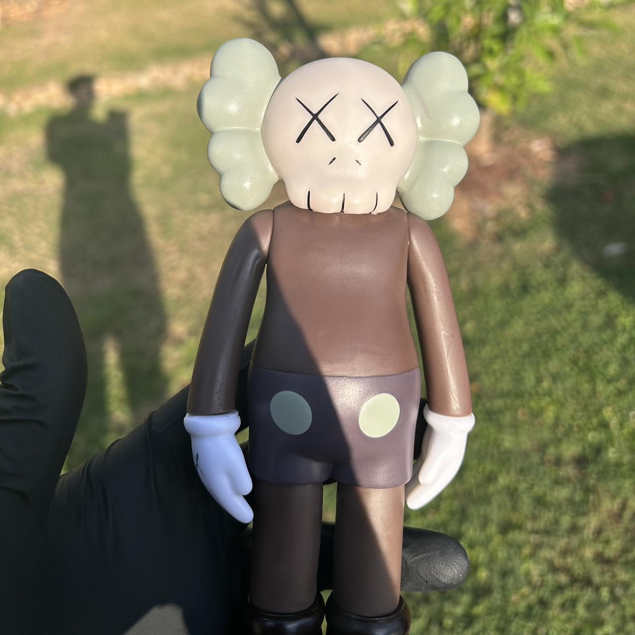 Brown Kaws character 10inch - Depop