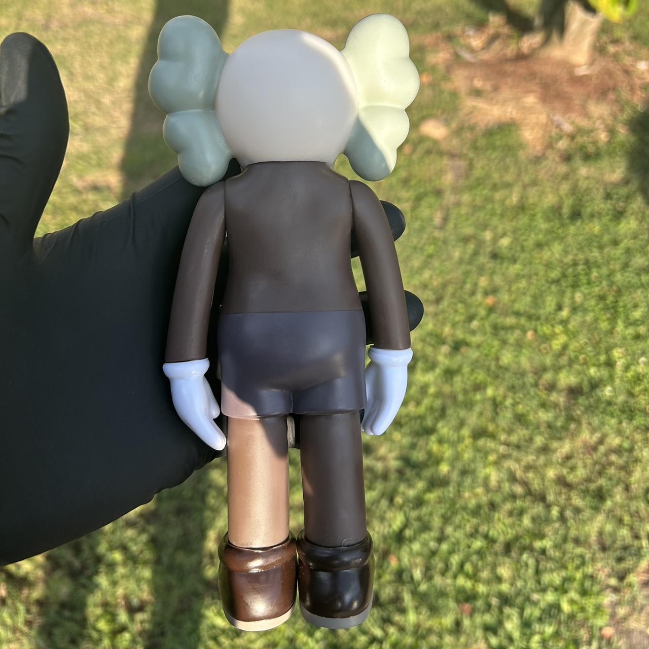 Brown Kaws character 10inch - Depop