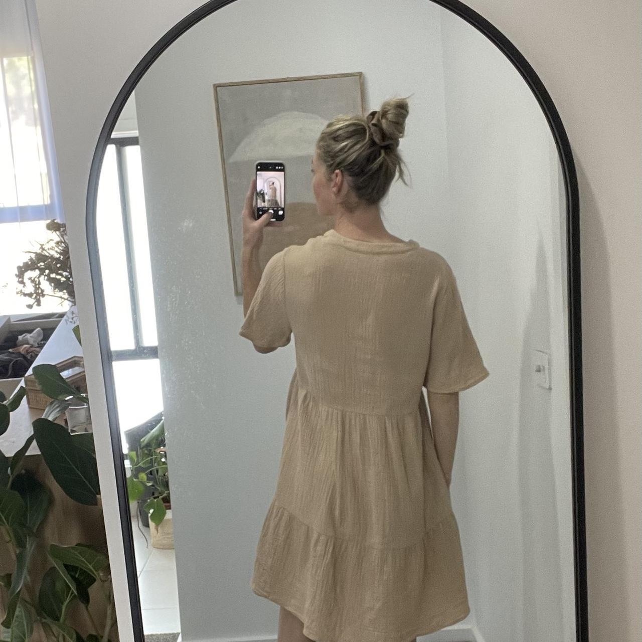 Tan and cream linen dress with a V neck and flared... - Depop