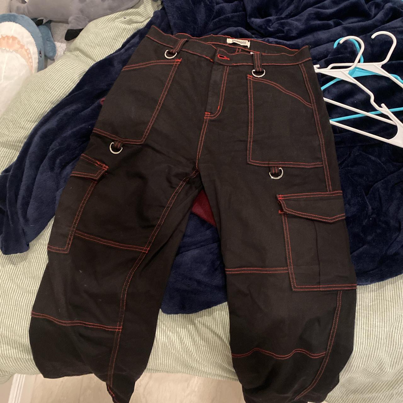 hot topic size 9 tripp pants black with red stitching - Depop