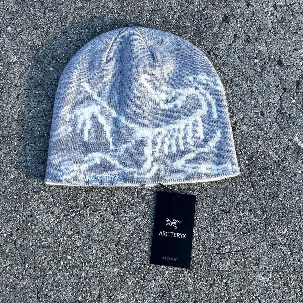 Grey and white Arc'teryx Dragon Beanie... | Depop