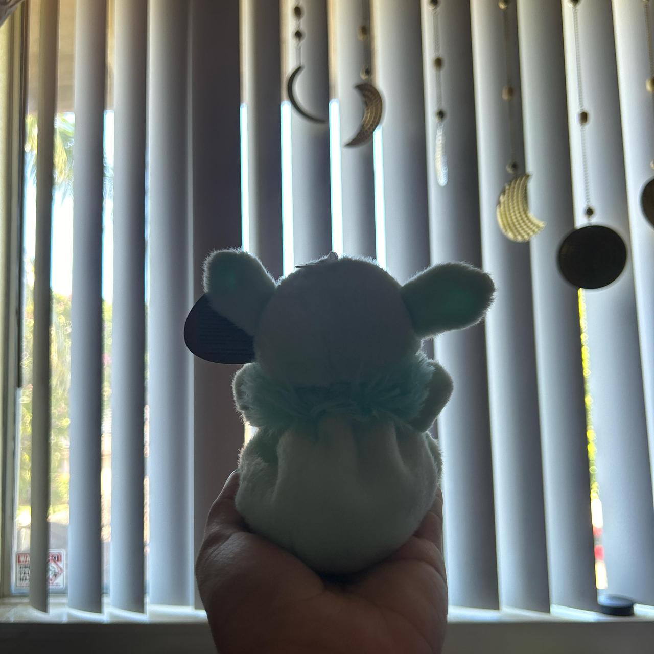 Palm pal teal gremlin plush - Depop