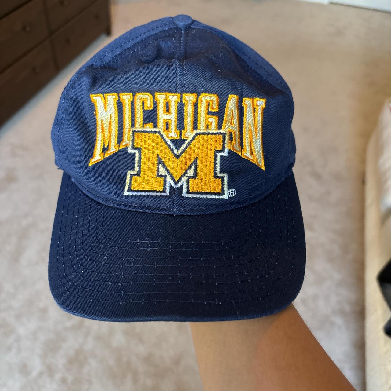 Vintage Navy and yellow Michigan Wolverines snapback... | Depop