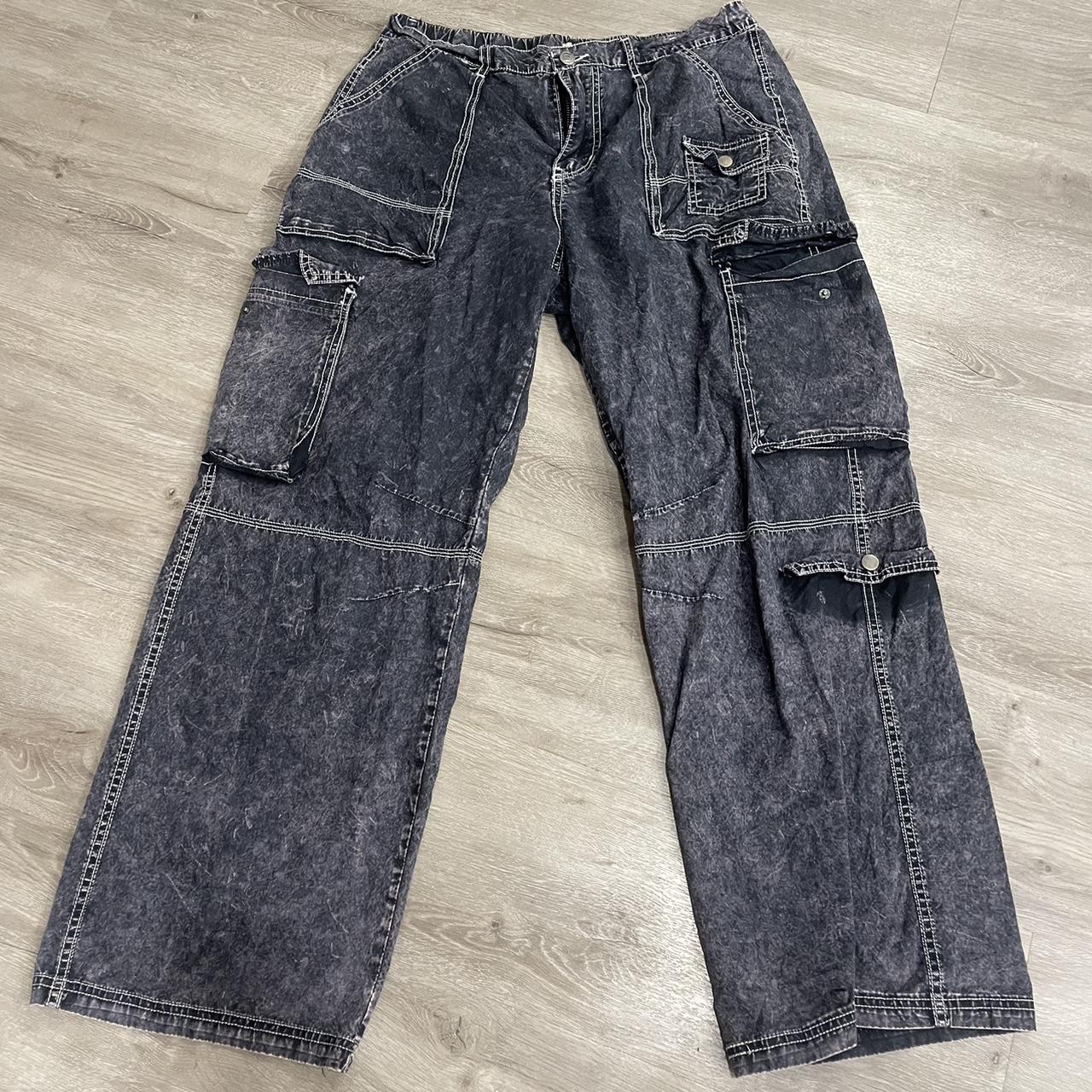 Black acid wash cargo pants with a baggy fit. There... - Depop