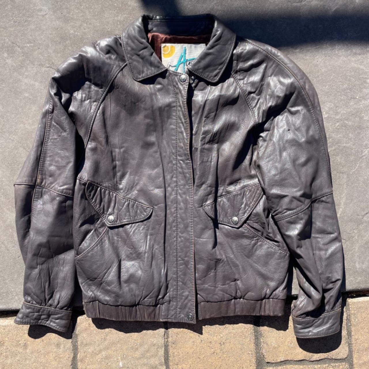 Brown vintage leather jacket, size medium but runs a... - Depop