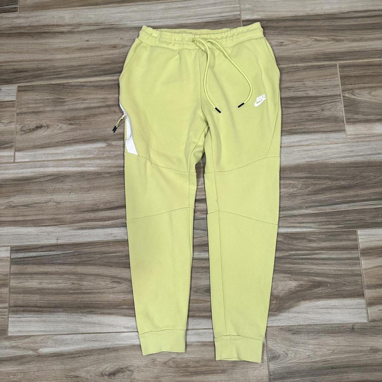 Nike yellow tech fleece joggers stain on back right | Depop