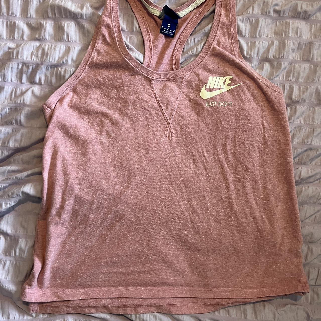 Pink Nike workout tank. Comes from a smoke free and... - Depop