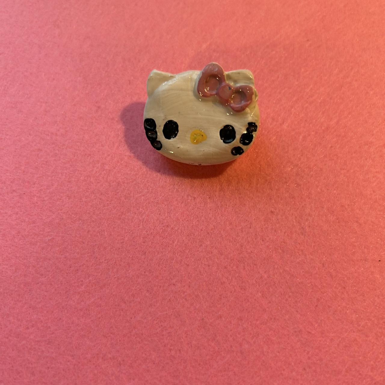 Handmade Hello Kitty clay charm with a pink bow -... - Depop