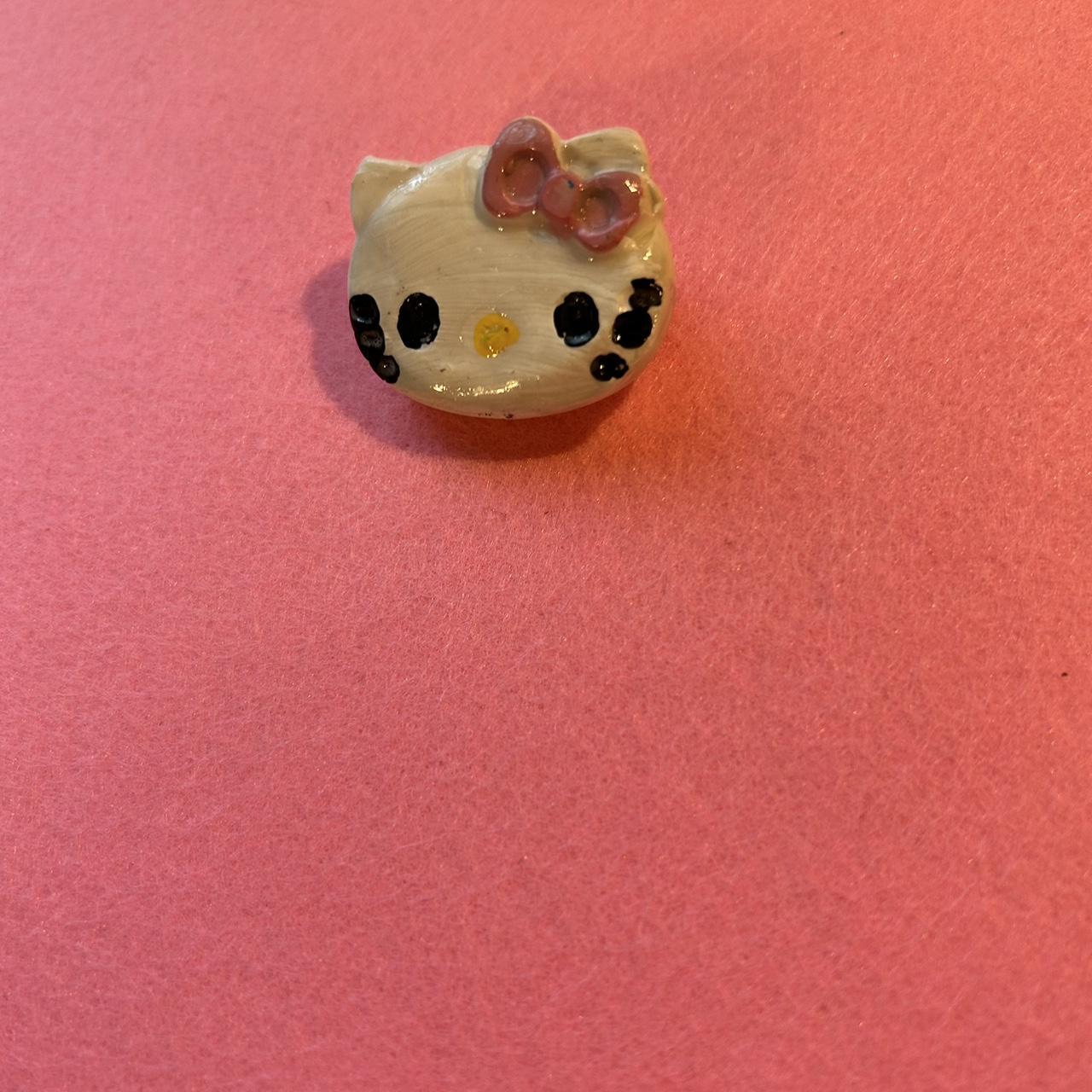 Handmade Hello Kitty clay charm with a pink bow -... - Depop