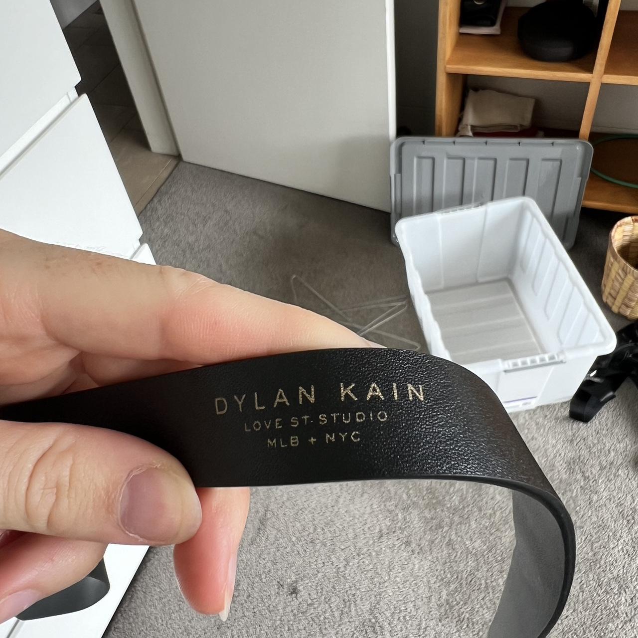 Dylan Kain belt - the gold part is quite scratched... - Depop
