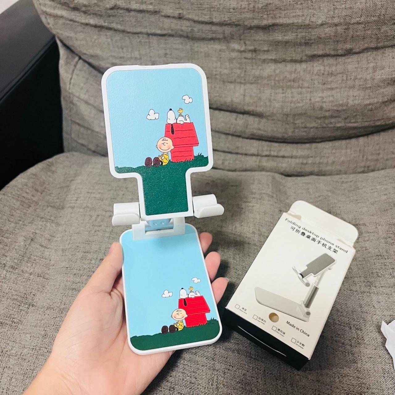 Brand new Snoopy adjustable phone holder/stand. - Depop